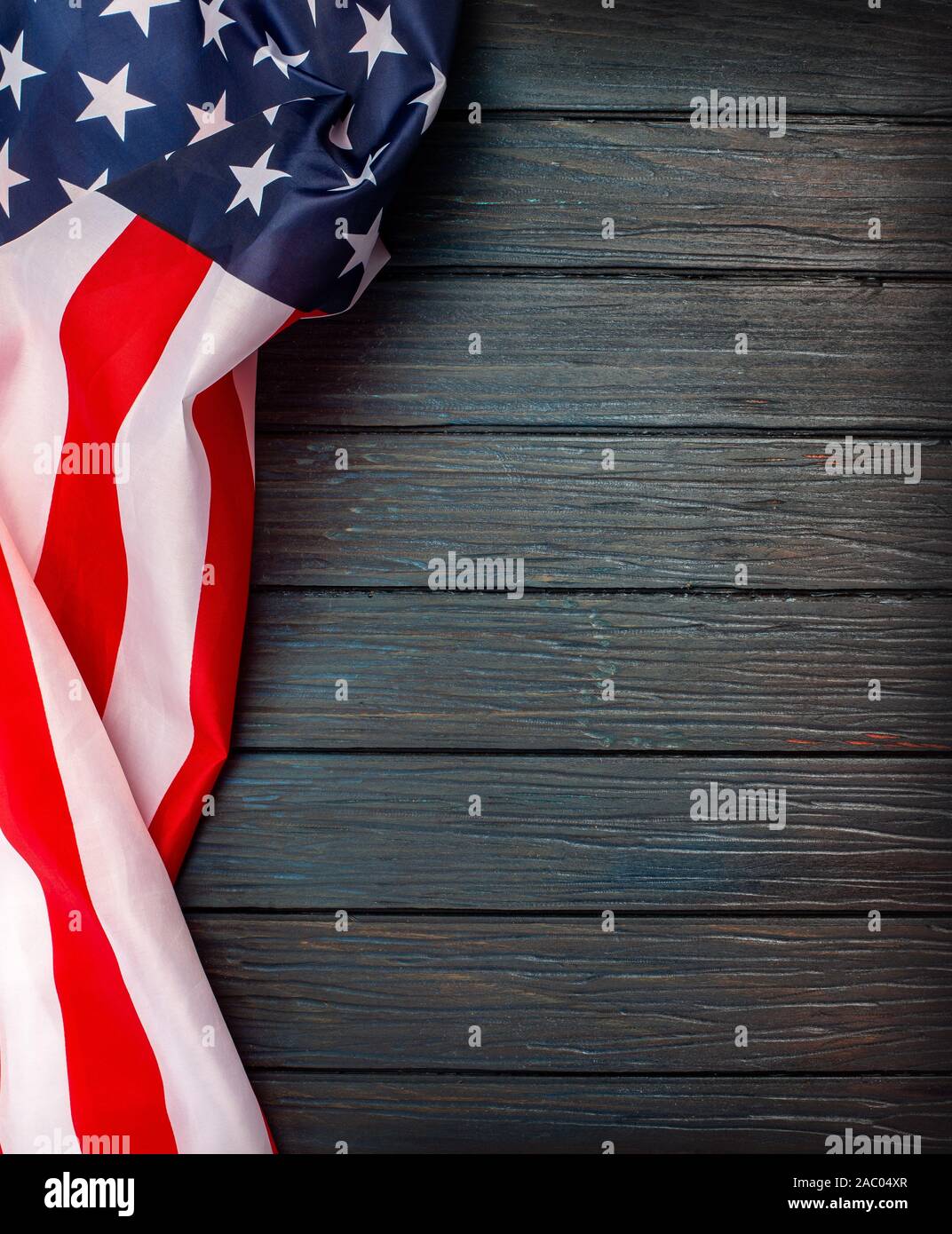 Crumpled US flag. US flag on wooden background. National banner on ...