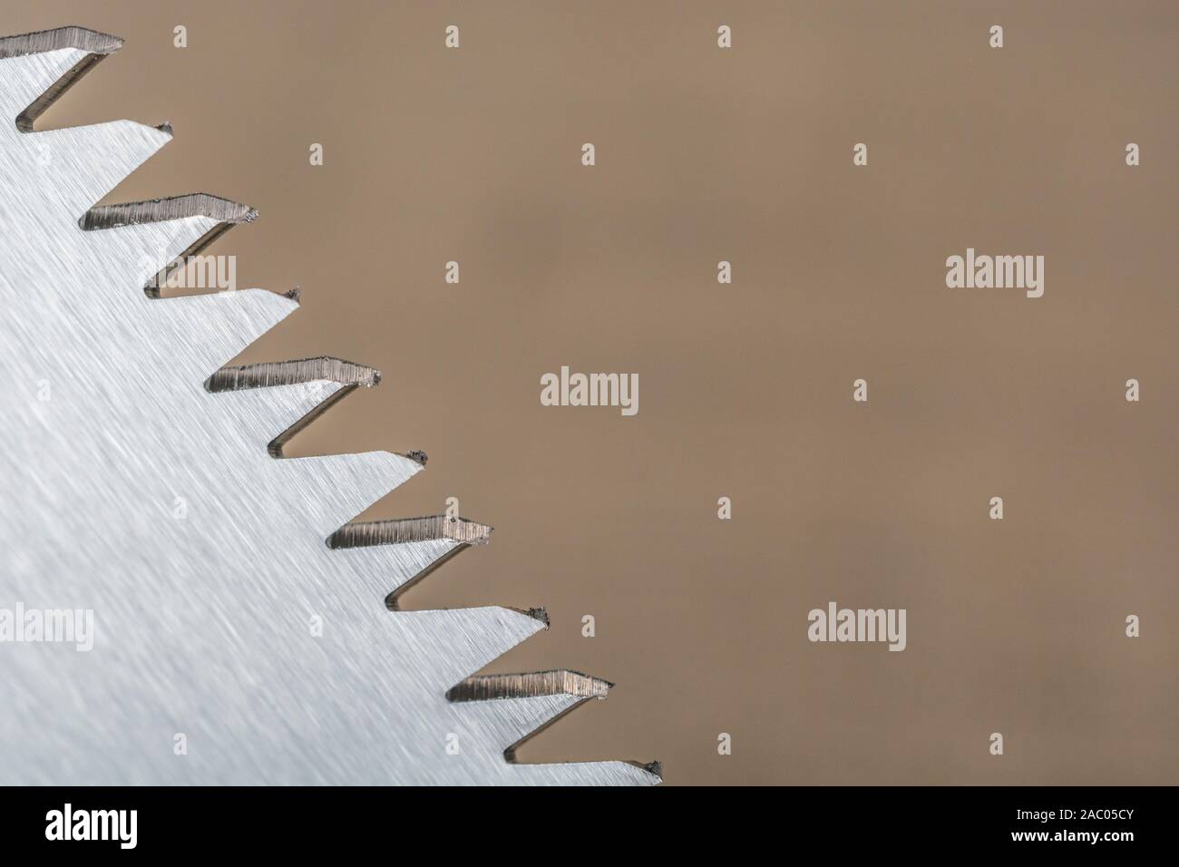 Macro close-up shot of the teeth of a short blade folding garden ...