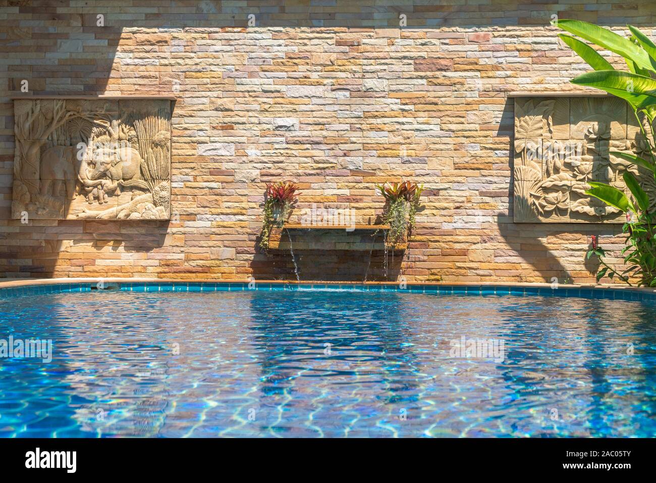 blue water in swimming pool beside the house Stock Photo - Alamy