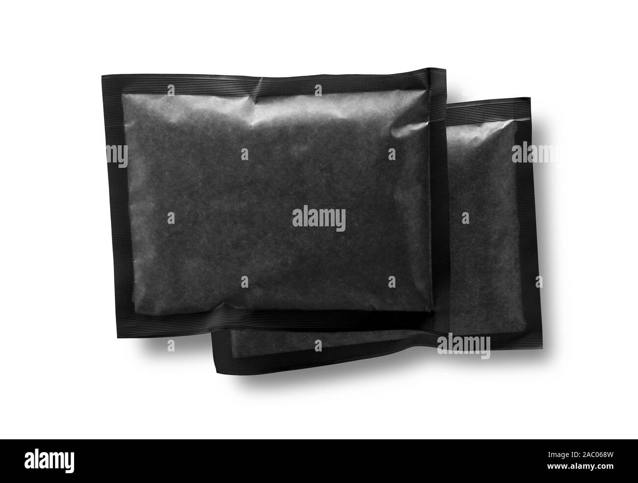 Black paper package isolated with clipping path Stock Photo - Alamy