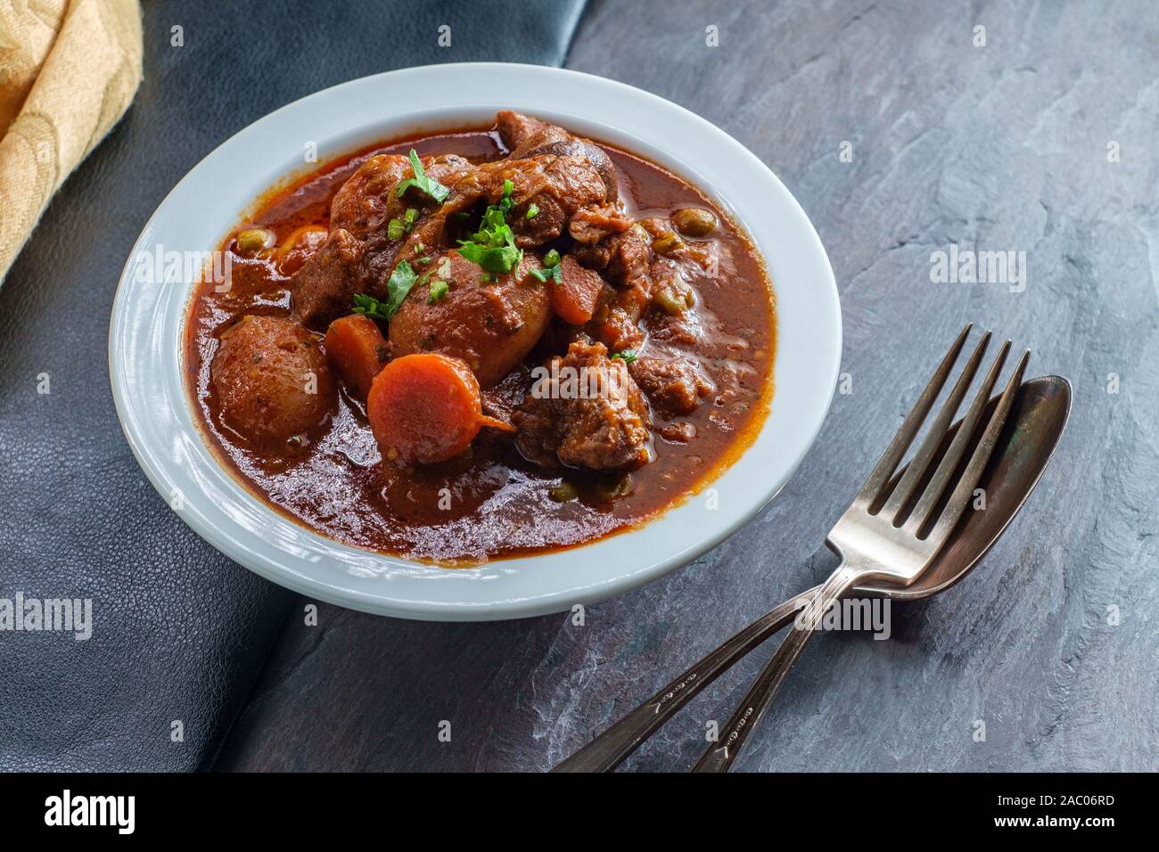 Authentic Irish beef beer stew with new potatoes carrots mushrooms and ...