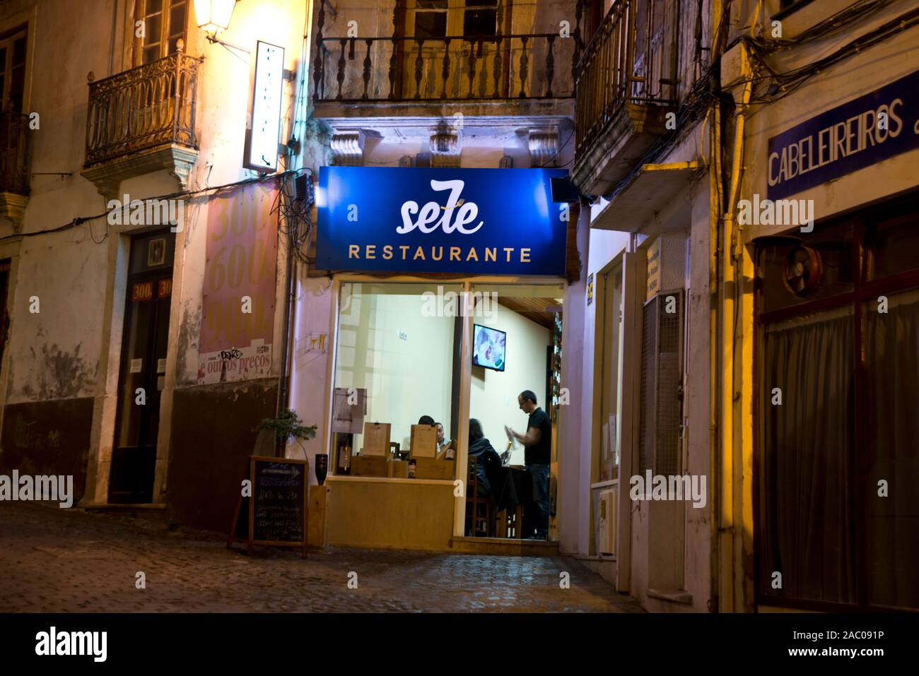 Traditional portuguese street scene in hi-res stock photography and ...