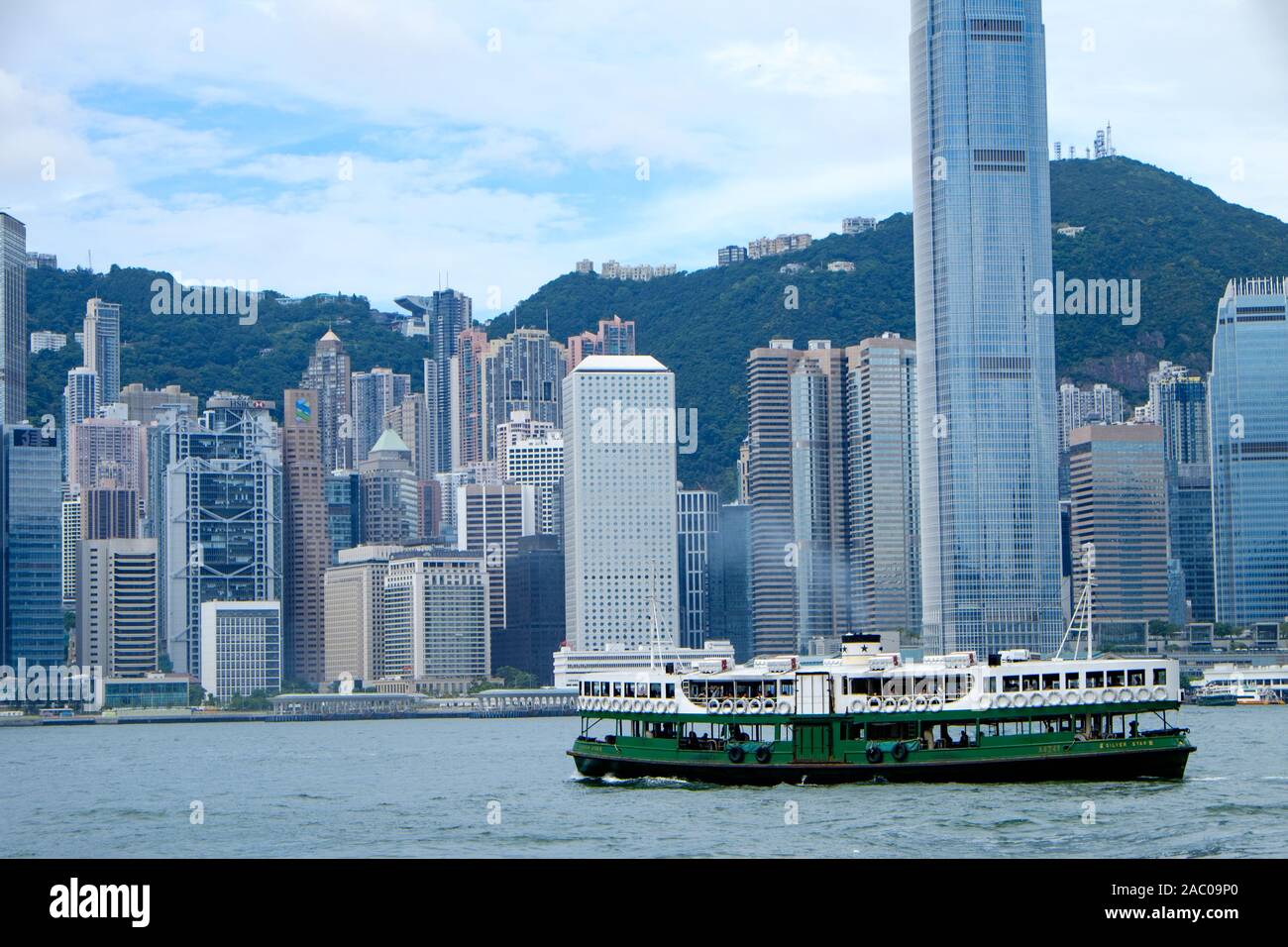 Hong Kong's Star Ferry transports passengers across Victoria Harbour, offering iconic views of ...