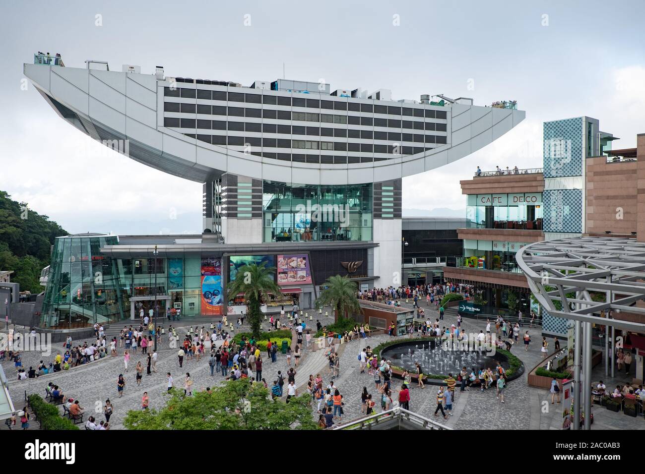 Tourists visit The Peak Tower in Hong Kong for shopping, dining, and ...