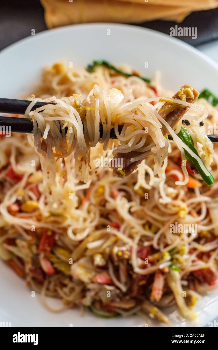 Chinese pork mei fun also known as Singapore-style noodles Stock Photo ...