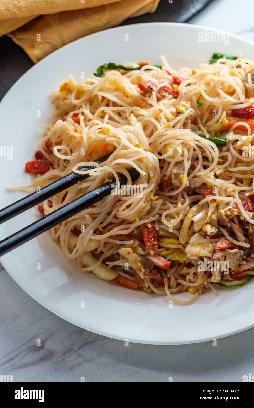 Chinese pork mei fun also known as Singapore-style noodles Stock Photo ...