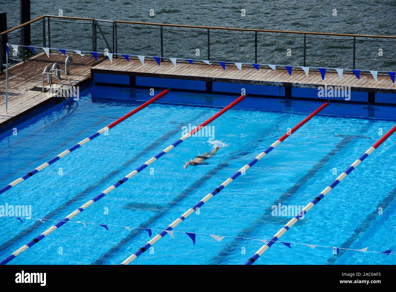 lone swimmer in the outdoor swimming pool in Helsinki Stock Photo - Alamy