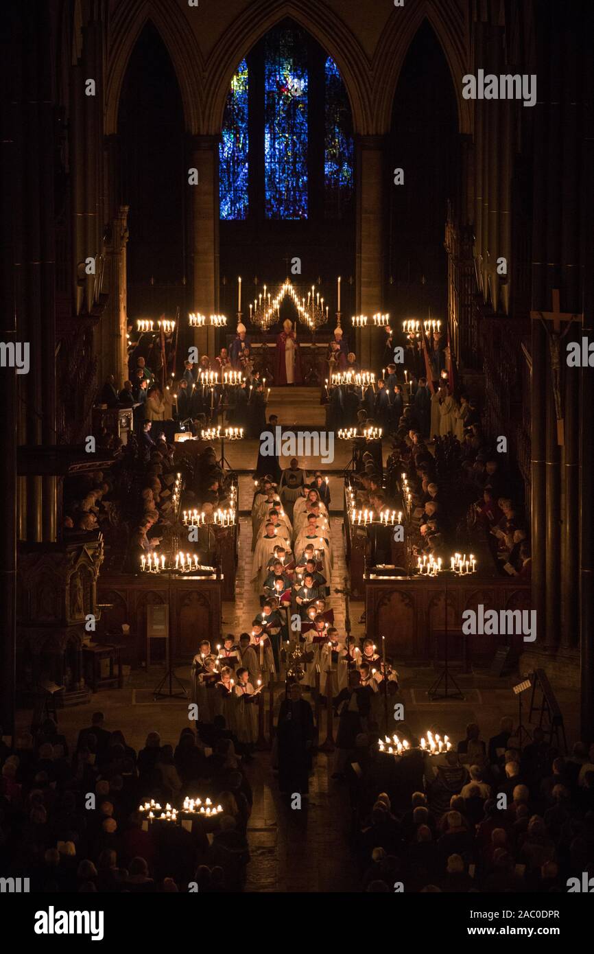 Candles are carried through Salisbury Cathedral during the advent ...