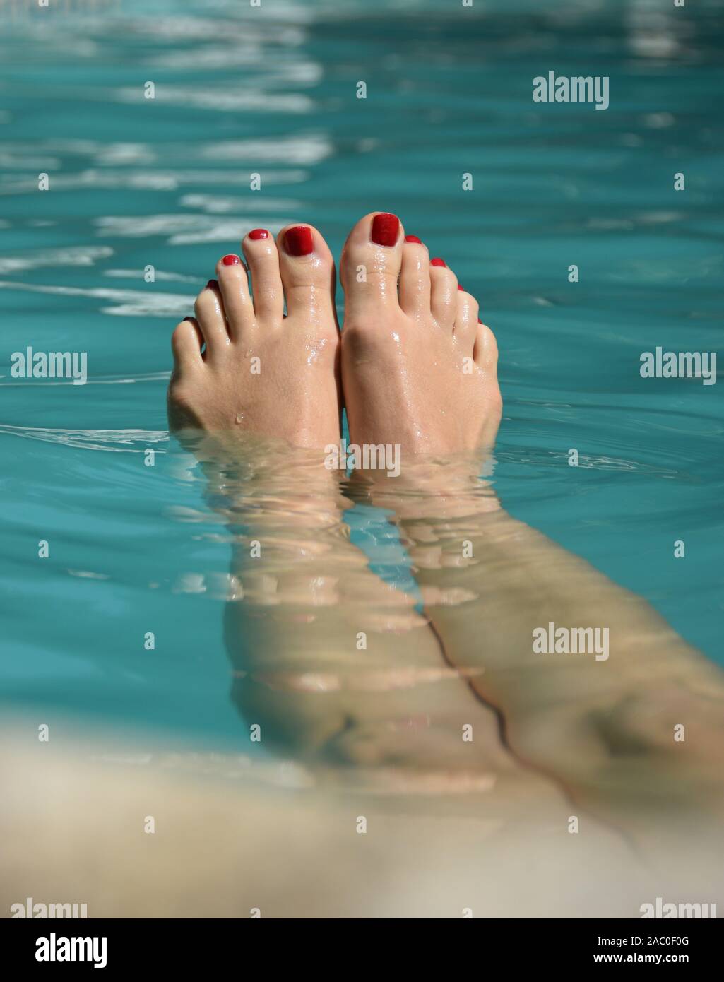 Beautiful feet toes swimming pool hi-res stock photography and images ...
