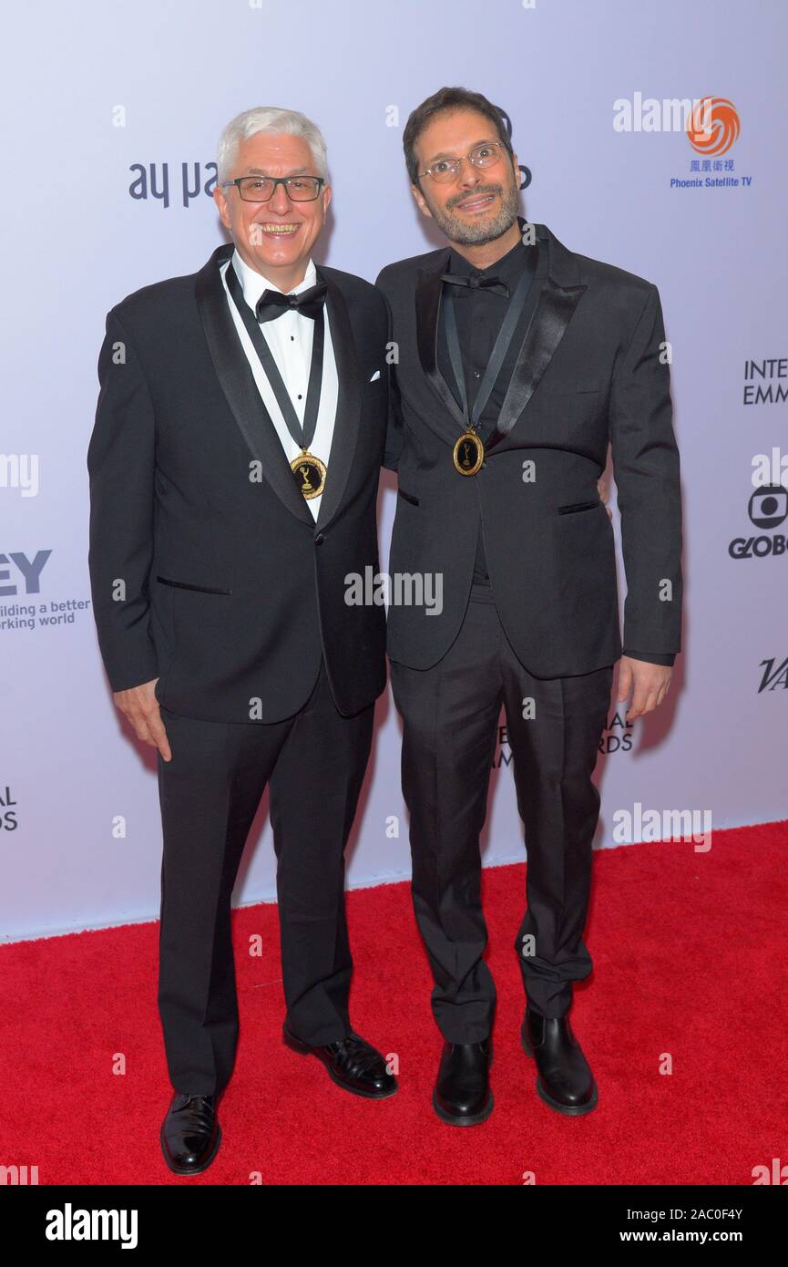 NEW YORK, NY - NOVEMBER 25: Roberto Rios and Carlos Nader attend the ...