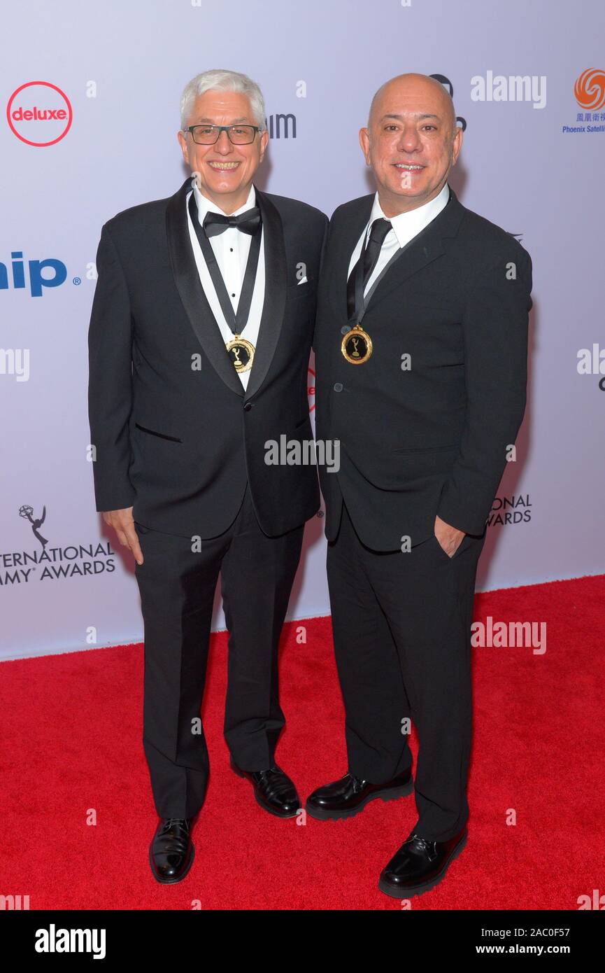 NEW YORK, NY - NOVEMBER 25: Roberto Rios and Claudio Torres attend the ...