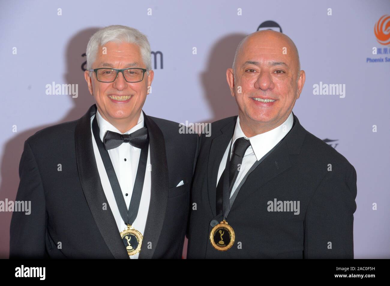 NEW YORK, NY - NOVEMBER 25: Roberto Rios and Claudio Torres attend the ...