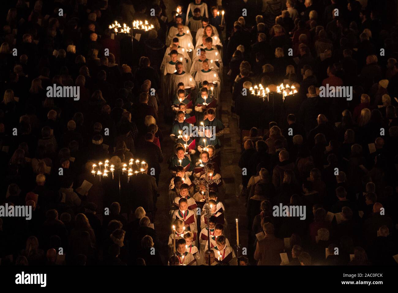 Candles are carried through Salisbury Cathedral during the advent ...
