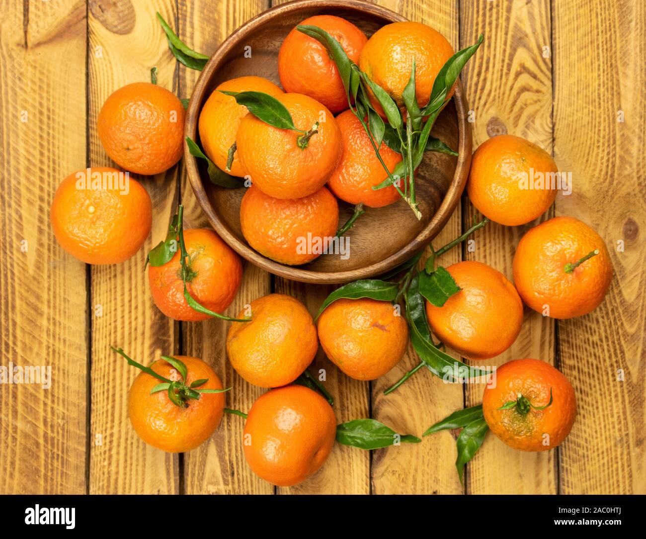 Mandarins over wood hi-res stock photography and images - Alamy