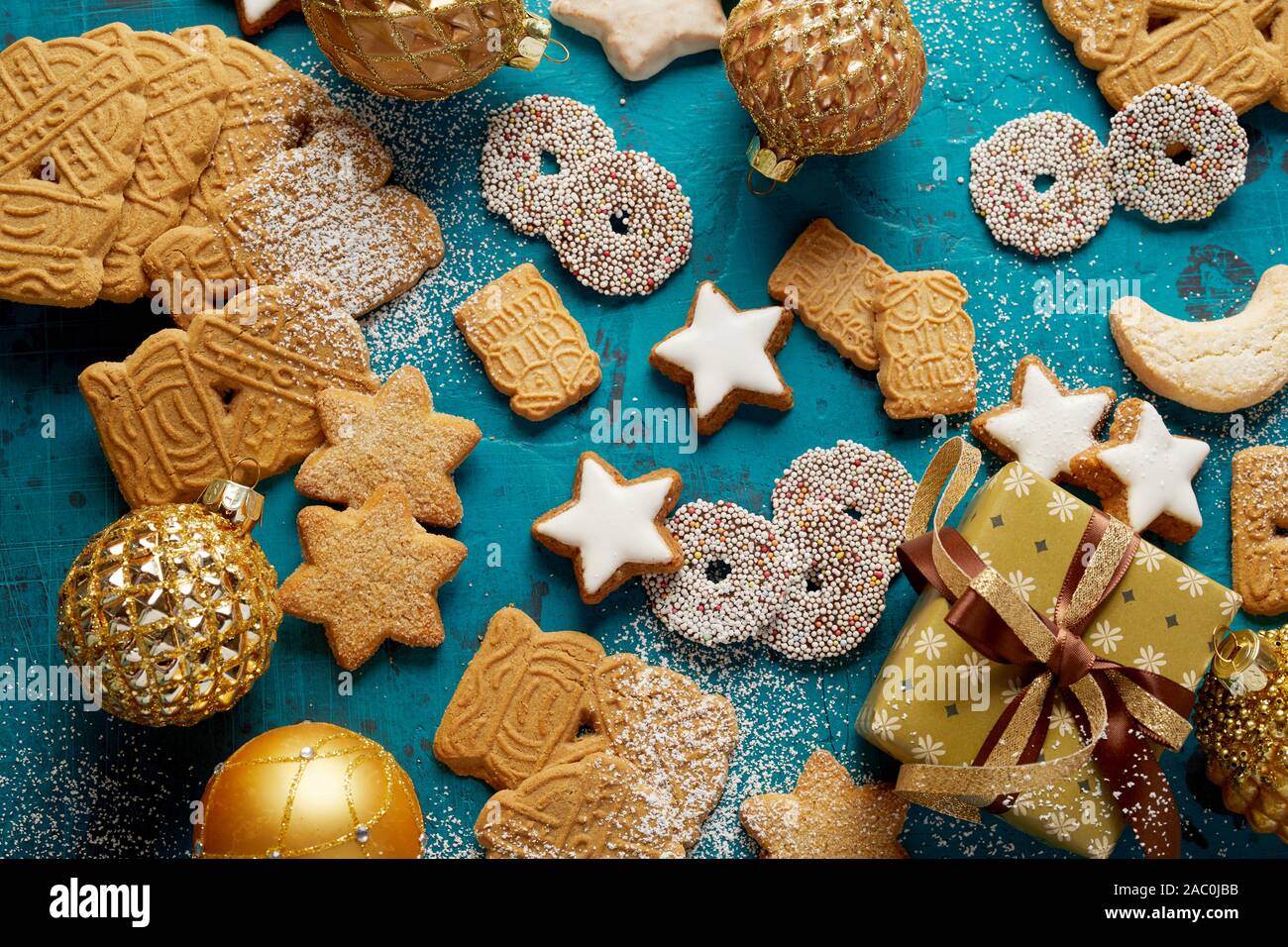 Christmas cookie or biscuit background with assorted shapes, including ...