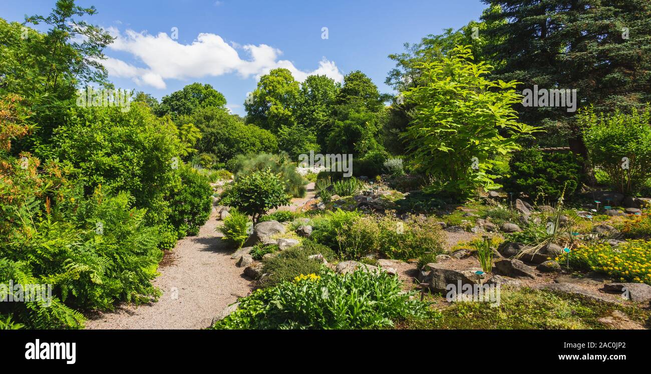 A lush green landscape in a public botanical garden in Lund, Sweden ...