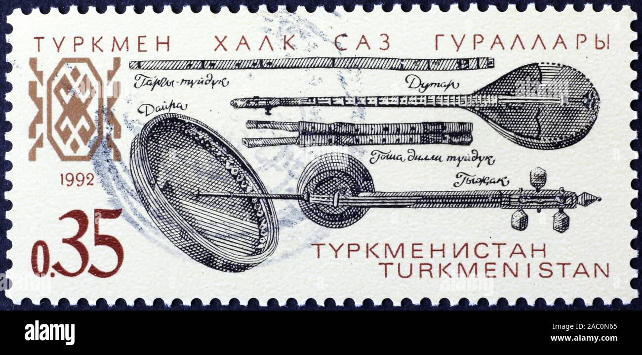 Traditional musical instruments of Turkmenistan on postage stamp Stock ...