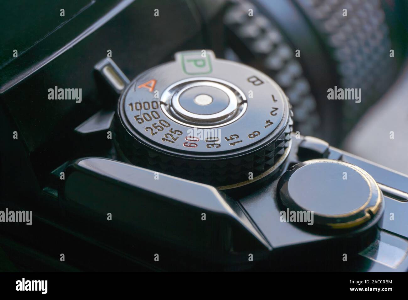 Close-up of mode and shutter speed dial of a vintage retro photo film ...