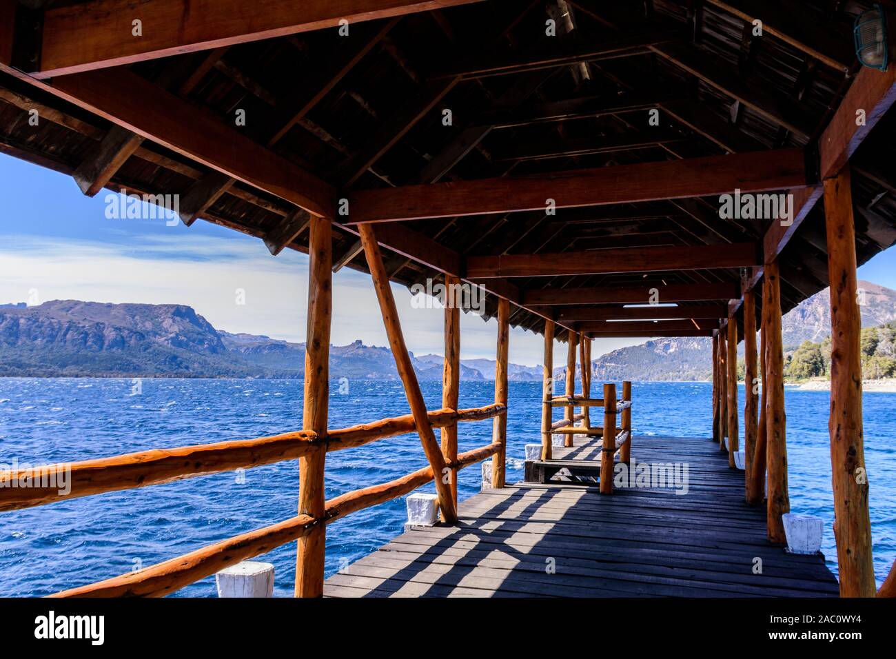 Scene view of wooden pier at Traful Lake in Villa Traful, Patagonia ...
