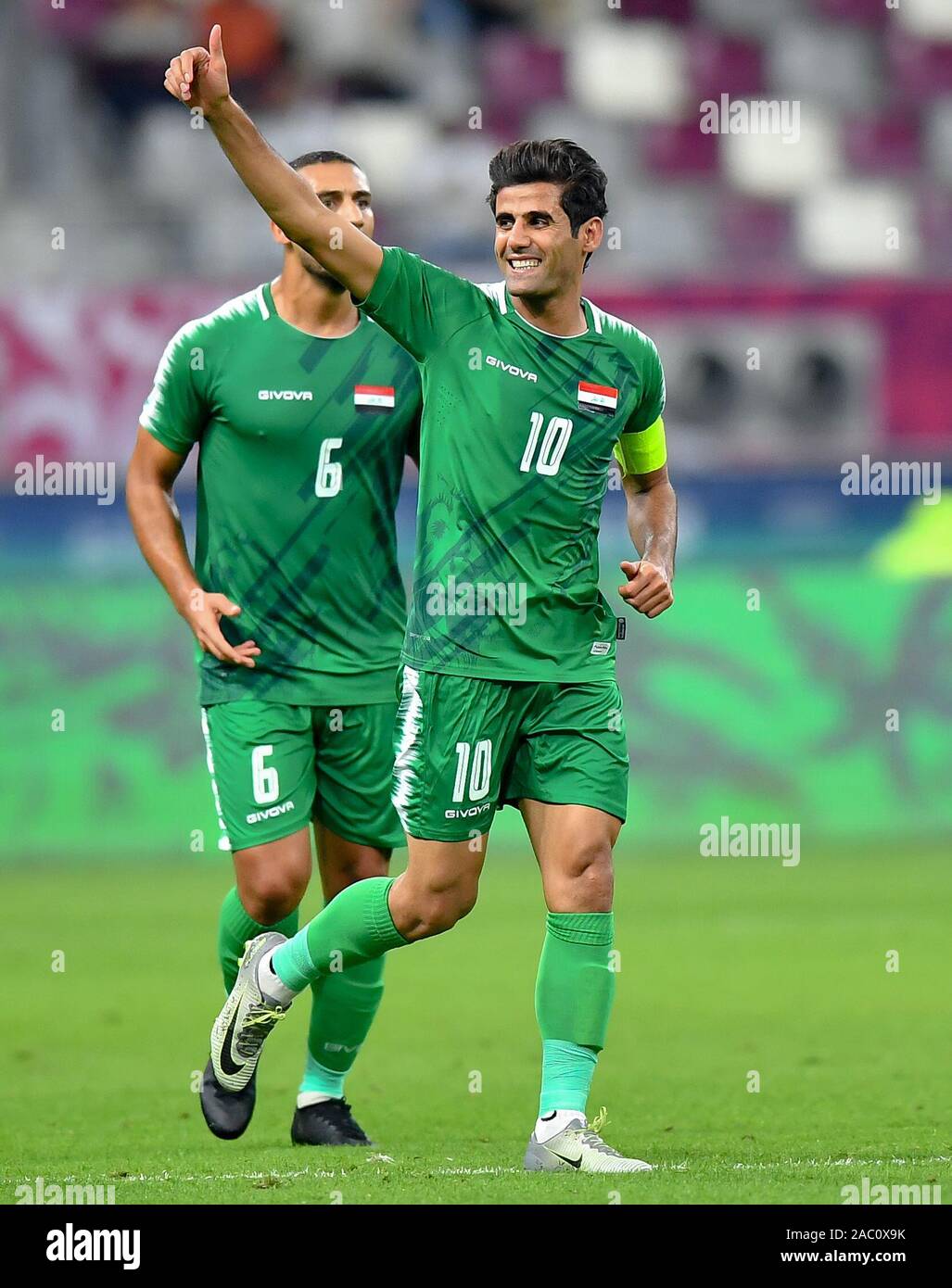Doha, Qatar. 29th Nov, 2019. Alaa Abdul-Zahra (R) of Iraq celebrates ...