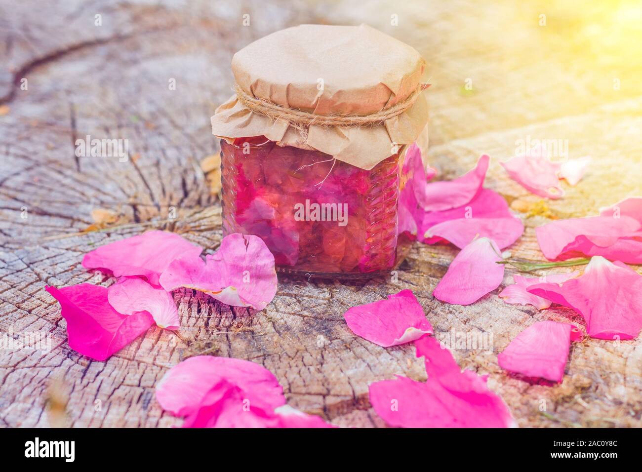 Still life with jam from rose with rose petals with blurred toned ...