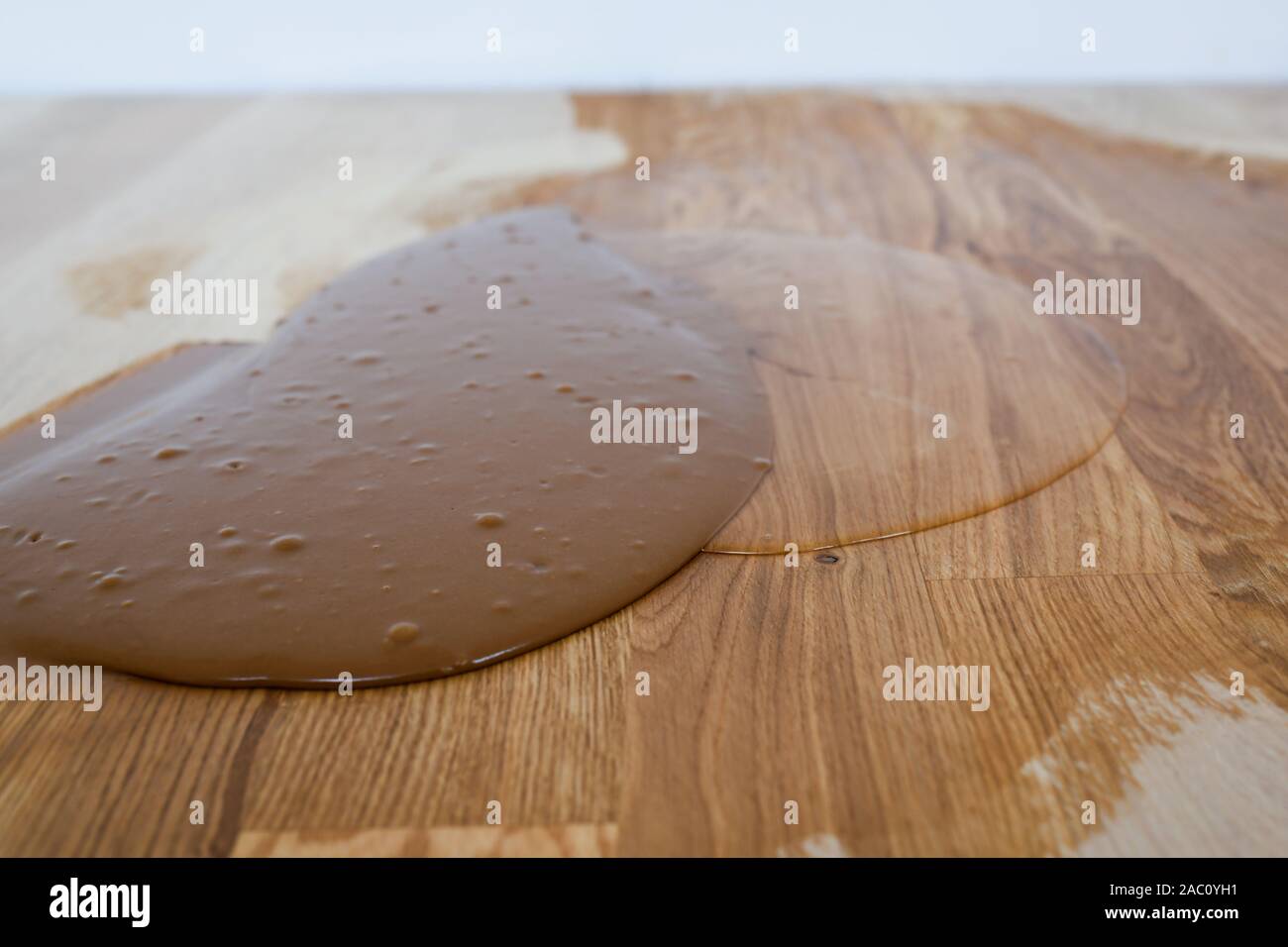 Preparation of parquet grout material. Mixing retainer, varnish and a ...