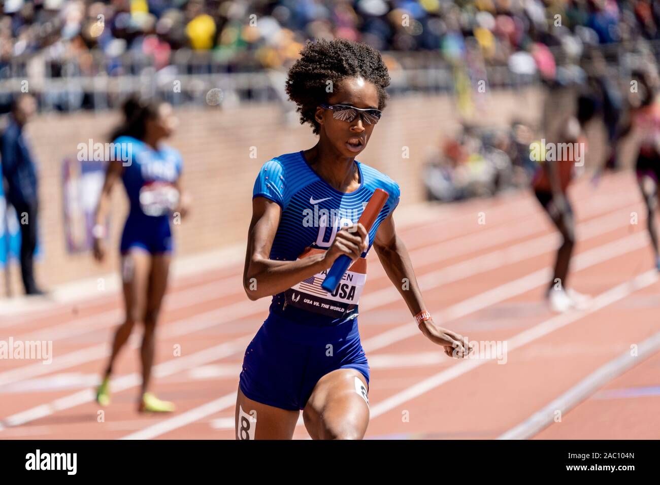 African woman runner relay hi-res stock photography and images - Alamy