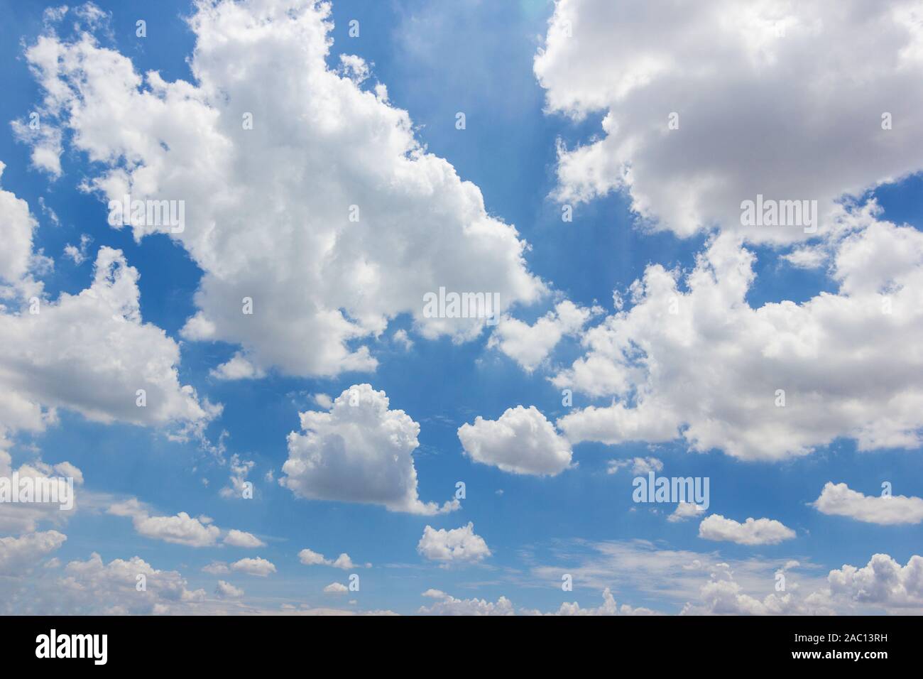 Transparent blue sky with clouds and atmospheric afternoon Stock Photo ...