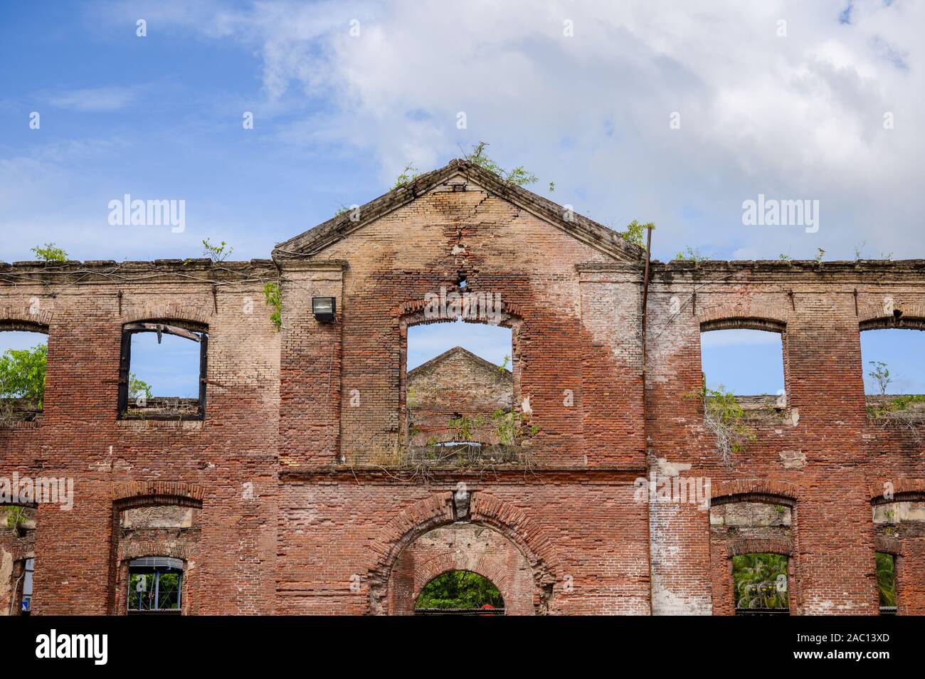 Burned out abandoned large brick building in Paramaribo, Suriname Stock ...