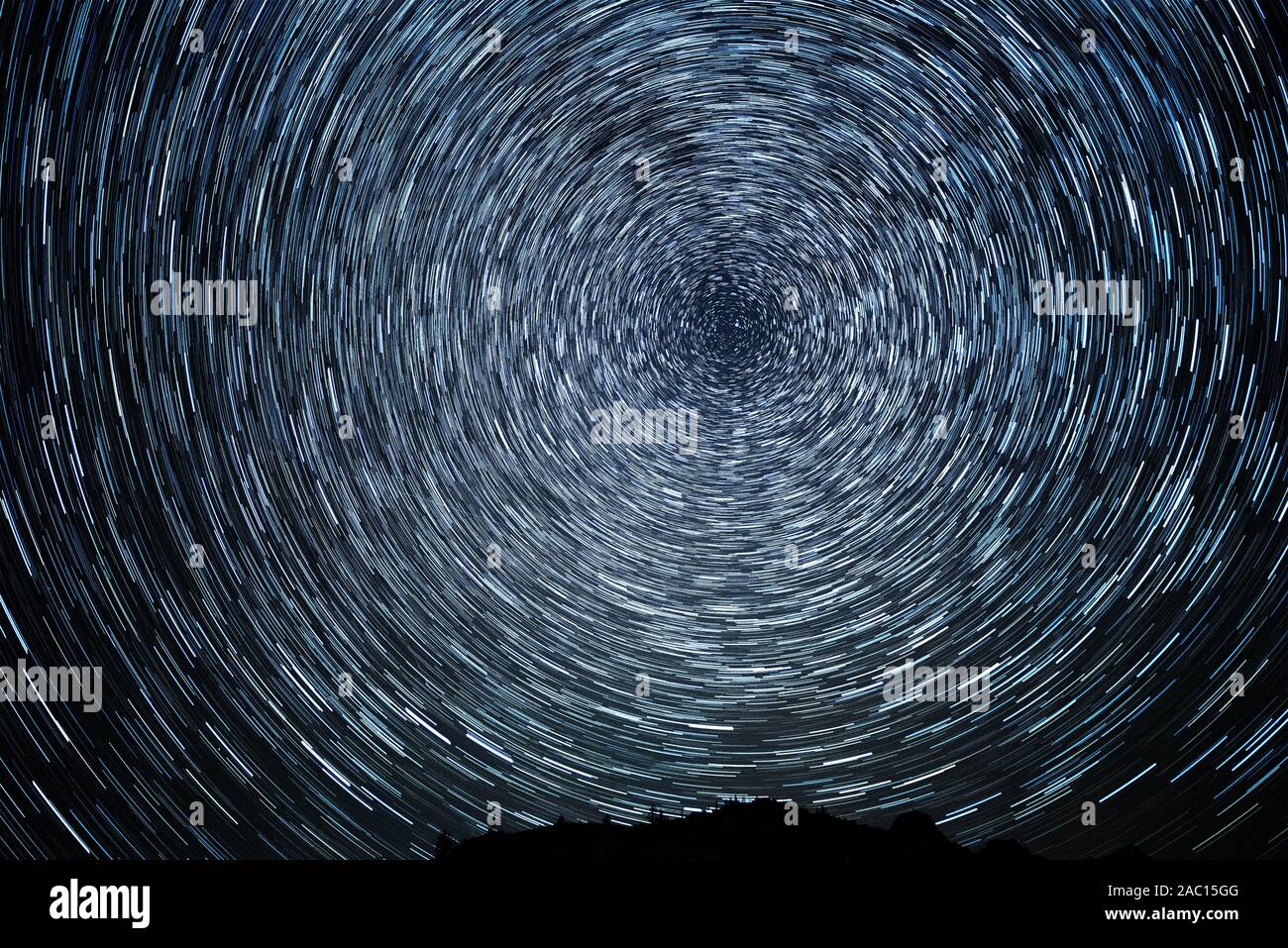 Photo of the night sky with star trails. A series of shots with a long ...