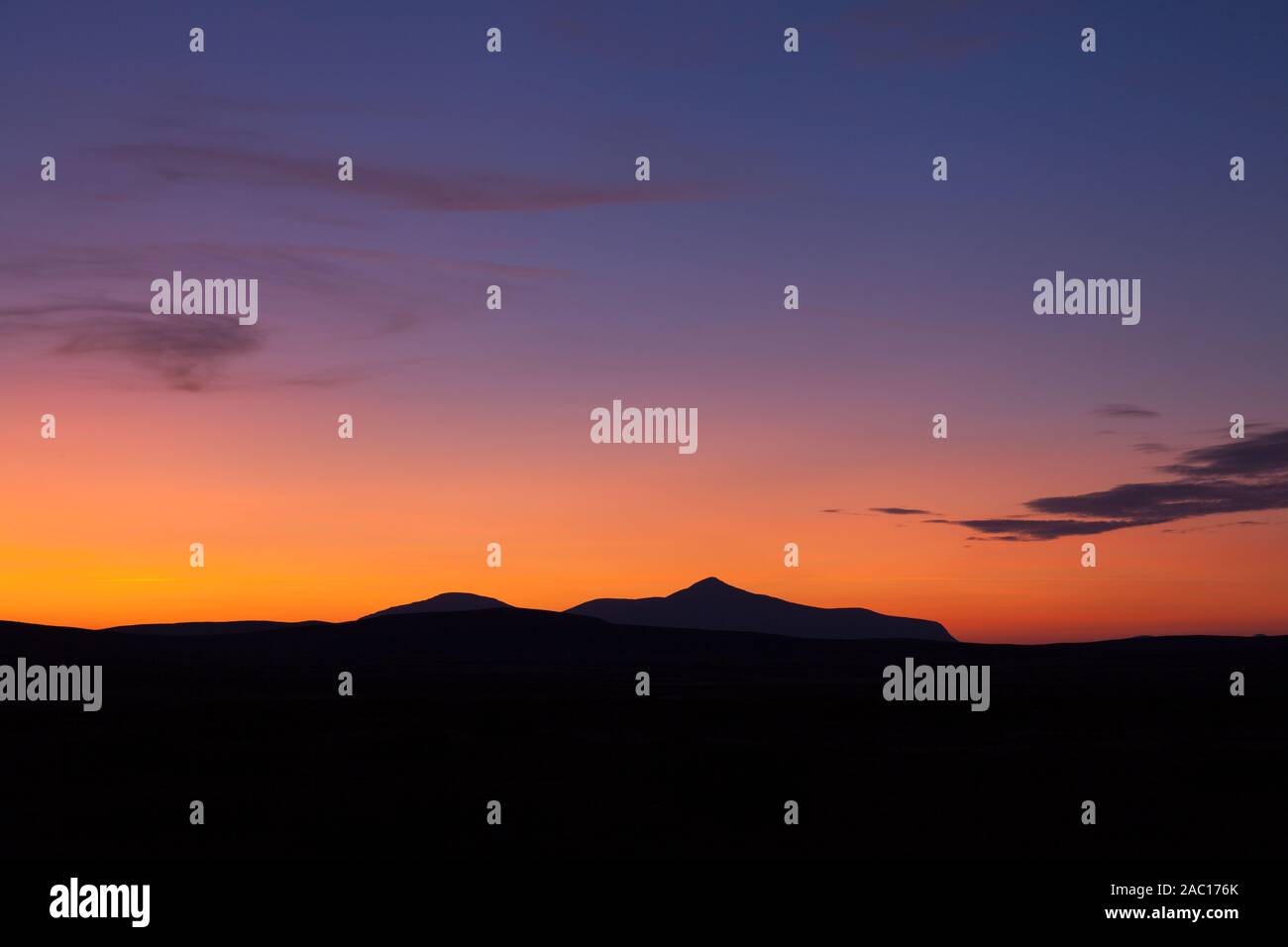 Colorful sky above the mountain landscape in nightfall Stock Photo - Alamy