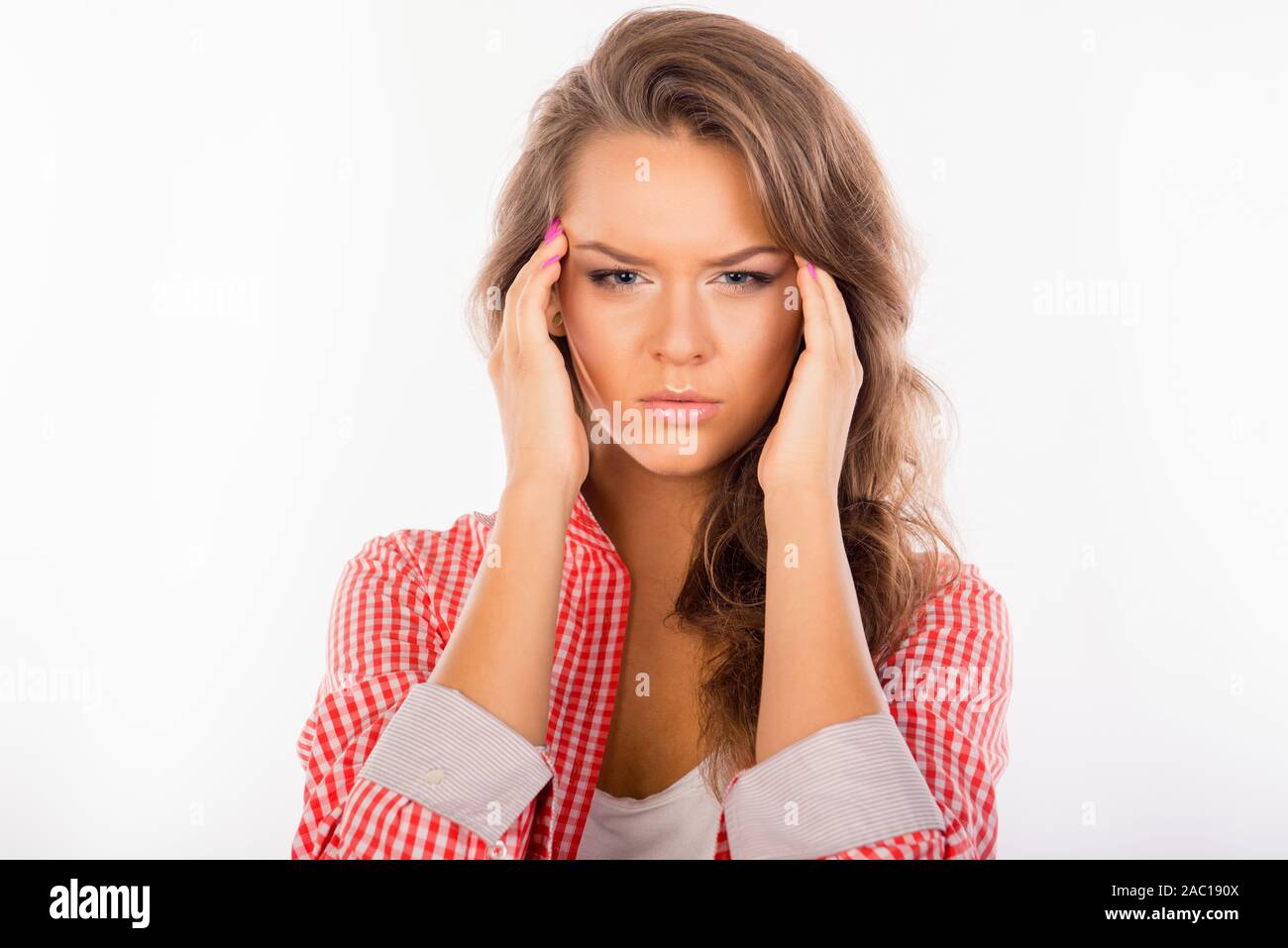 Tired cute girl suffering from headache Stock Photo - Alamy