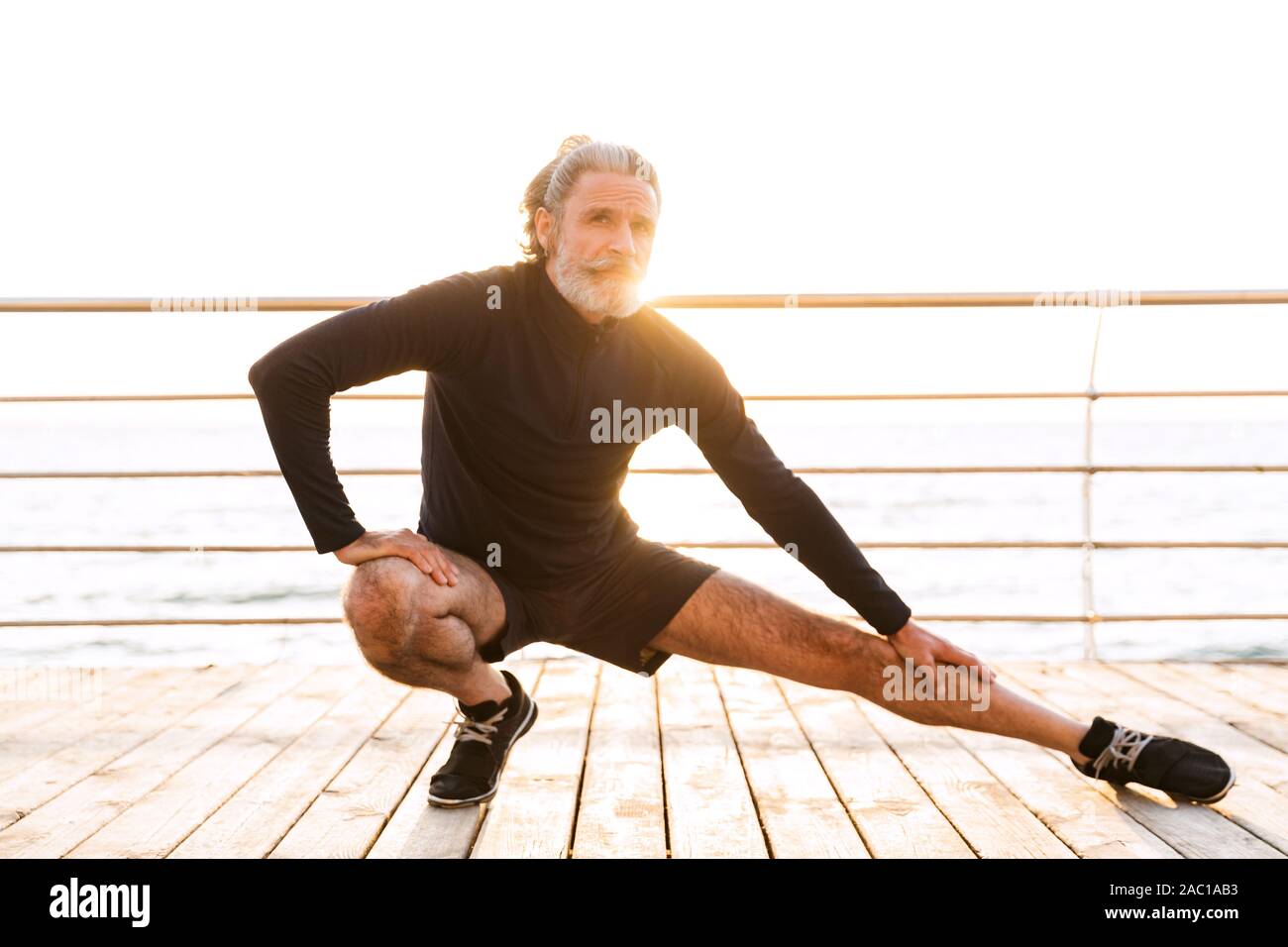 Elderly Man In Tracksuit High Resolution Stock Photography and Images ...
