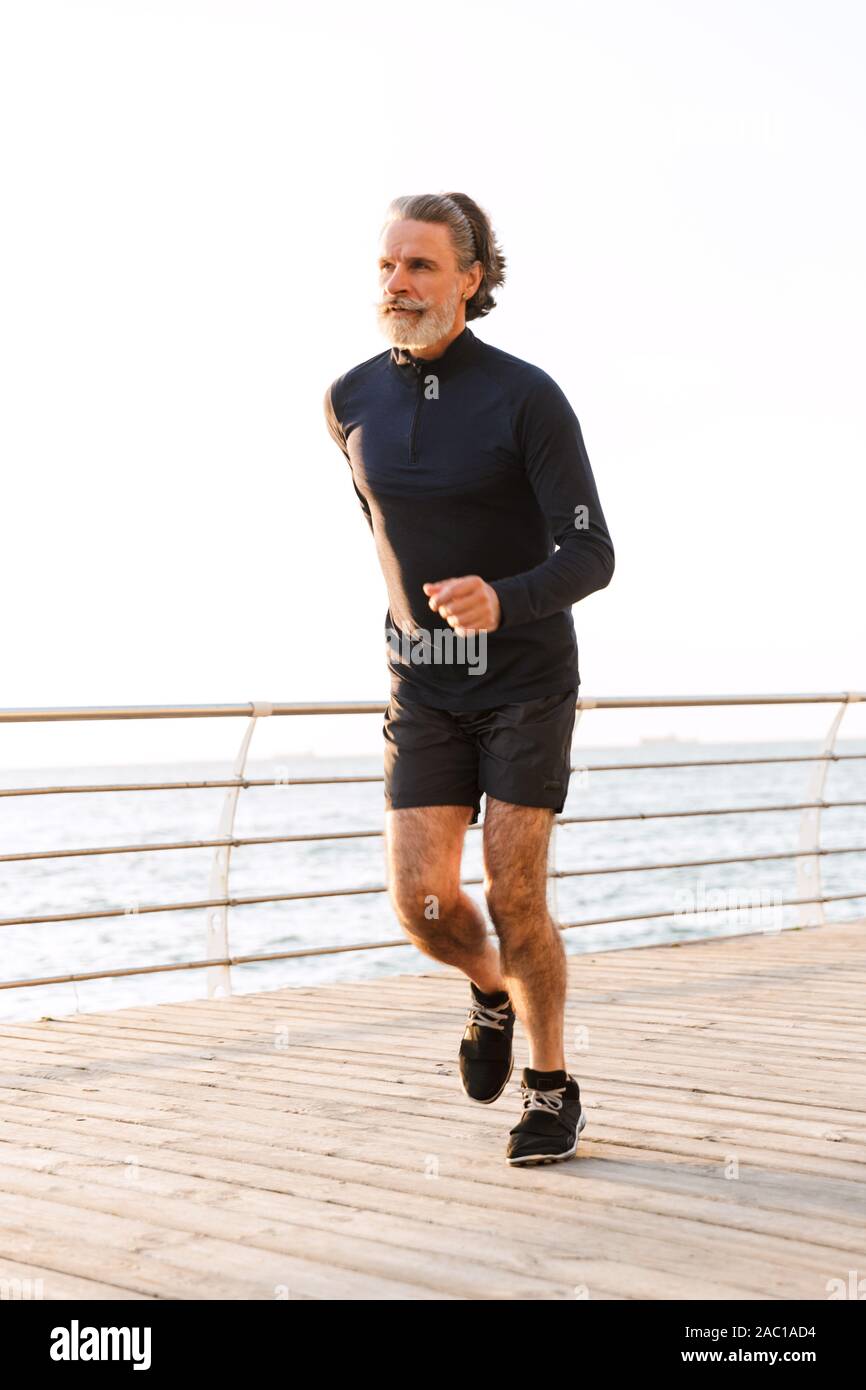 Old man running alone hi-res stock photography and images - Alamy