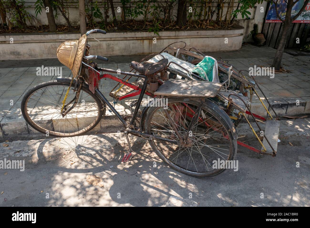 Bicycle rickshaw yangon myanmar hi-res stock photography and images - Alamy