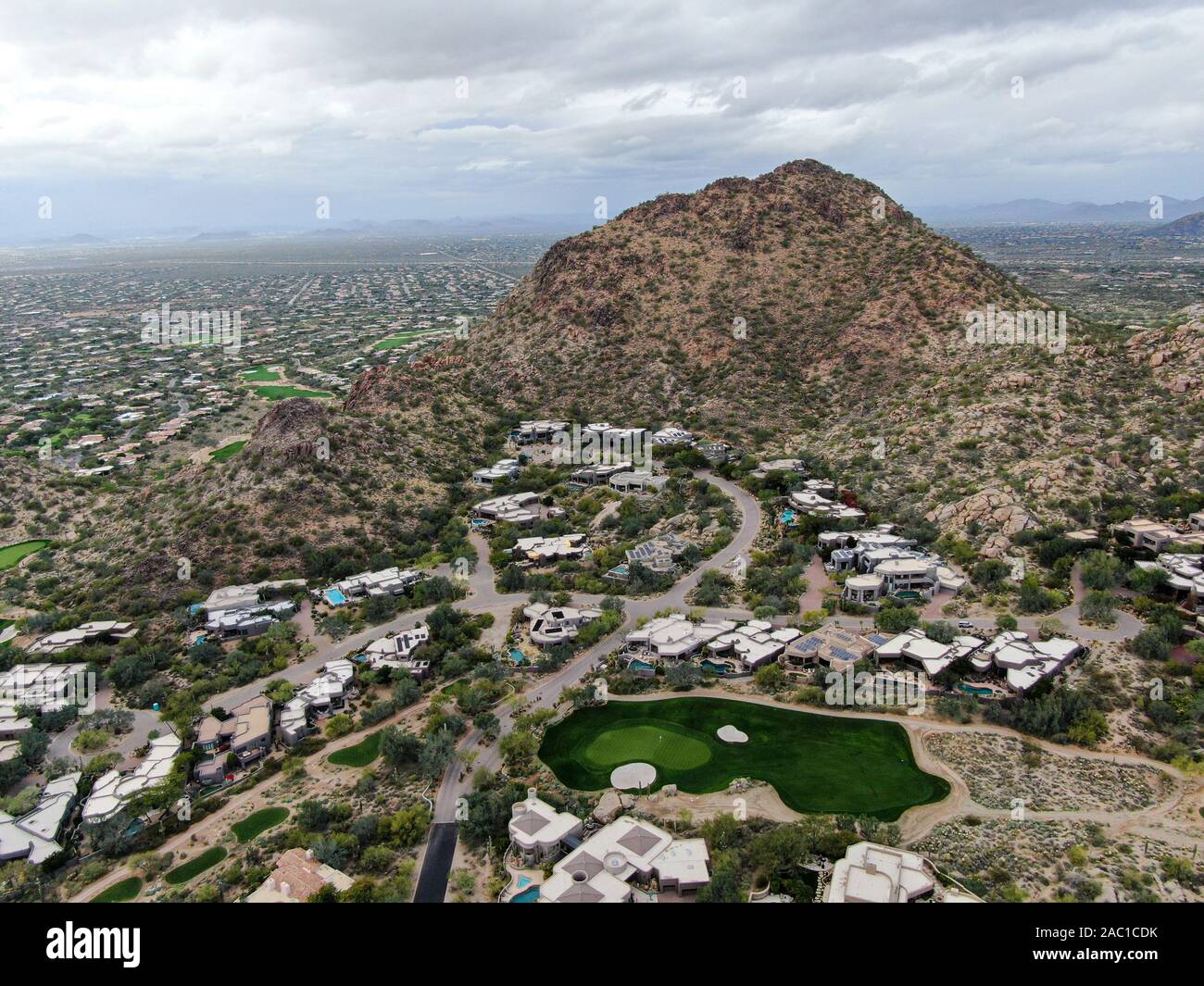 Aerial view above golf course and upscale luxury homes in Scottsdale ...