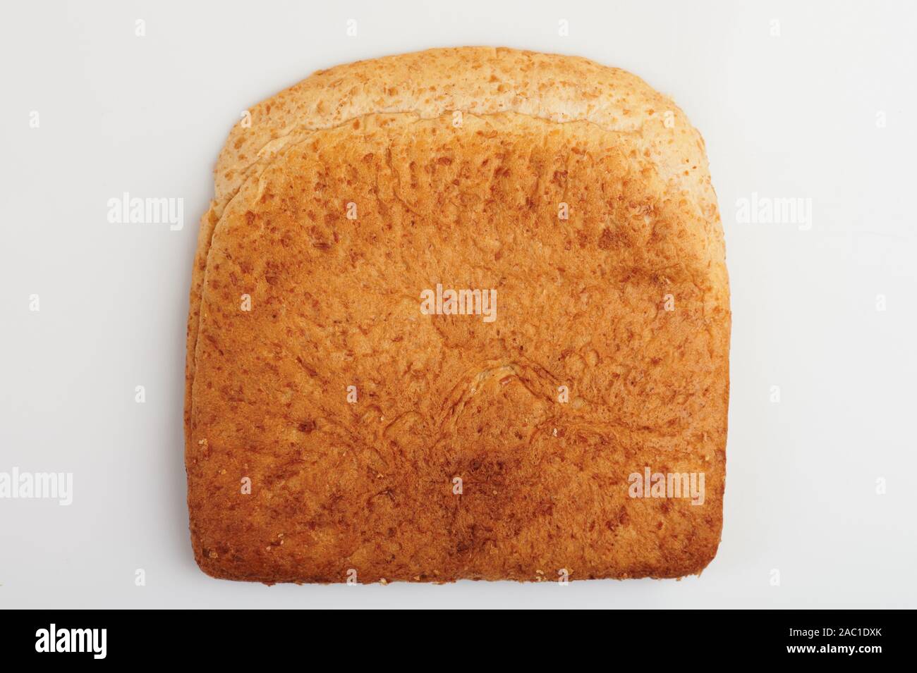 Back view of wholemeal bread slice isolated on white background Stock ...