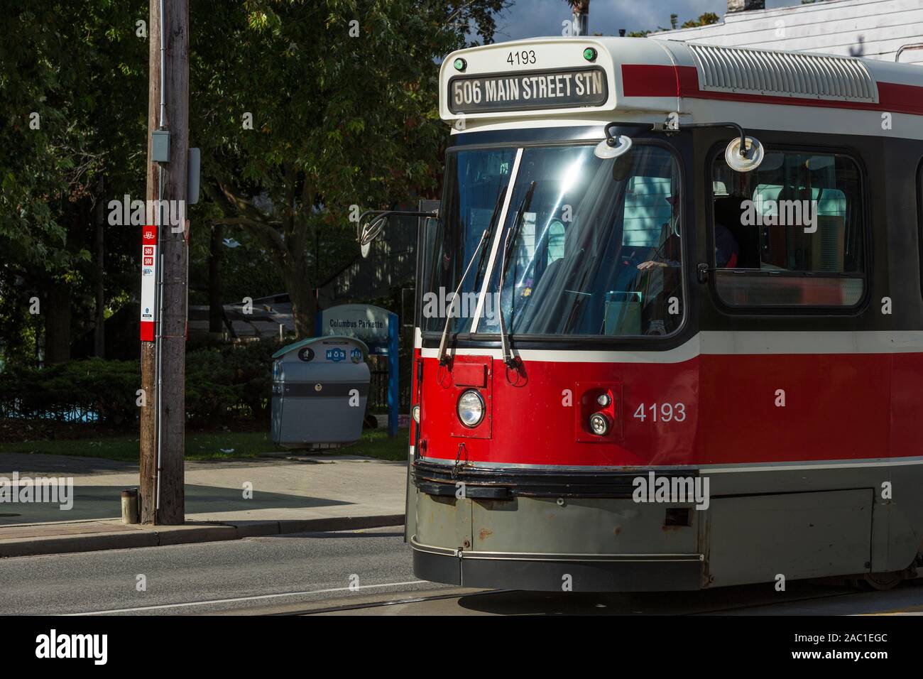 toronto ttc streetcar on city street transit in urban environment sunny ...