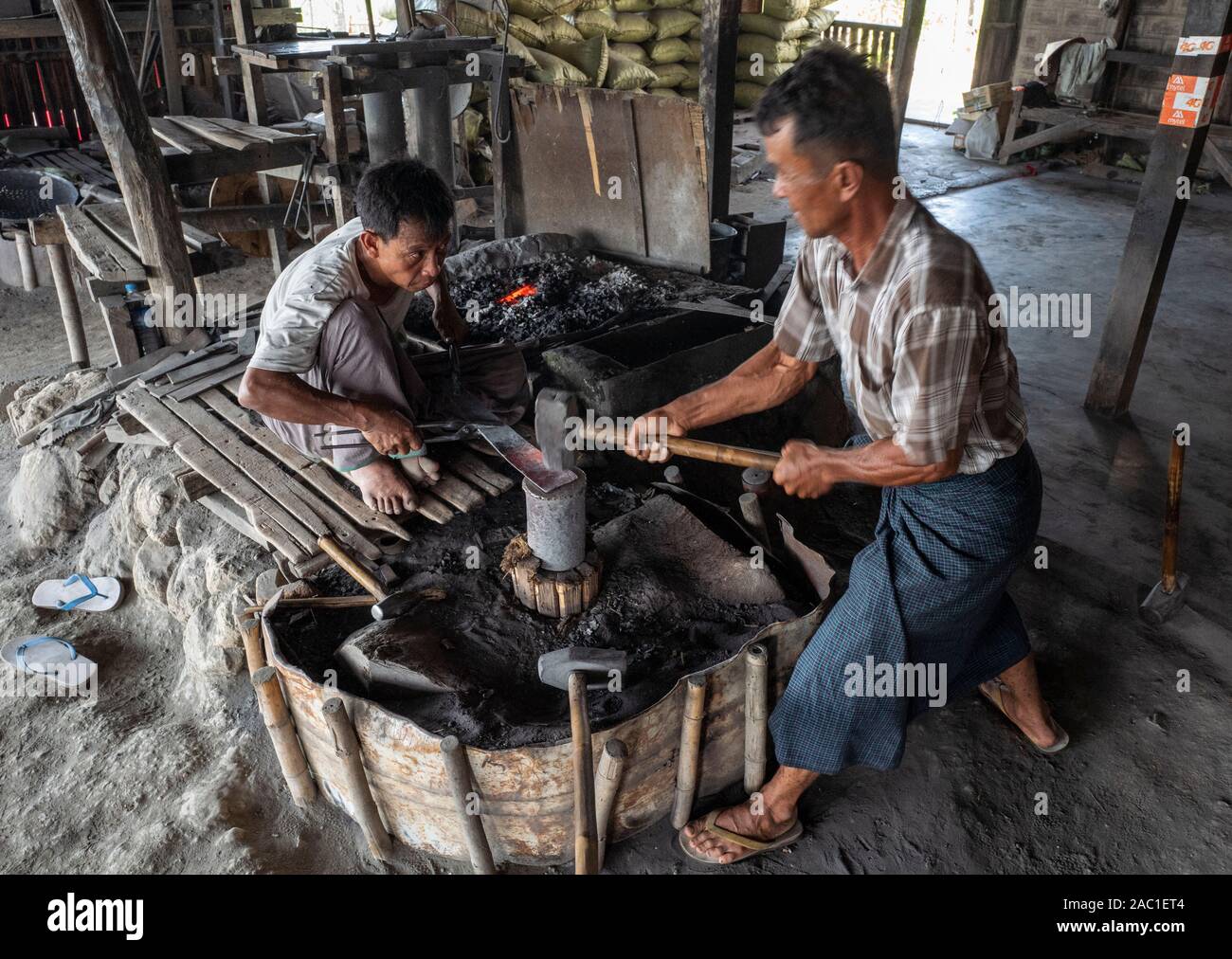 Traditional blacksmith workers on Inle Lake in Myanmar, Asia Stock ...