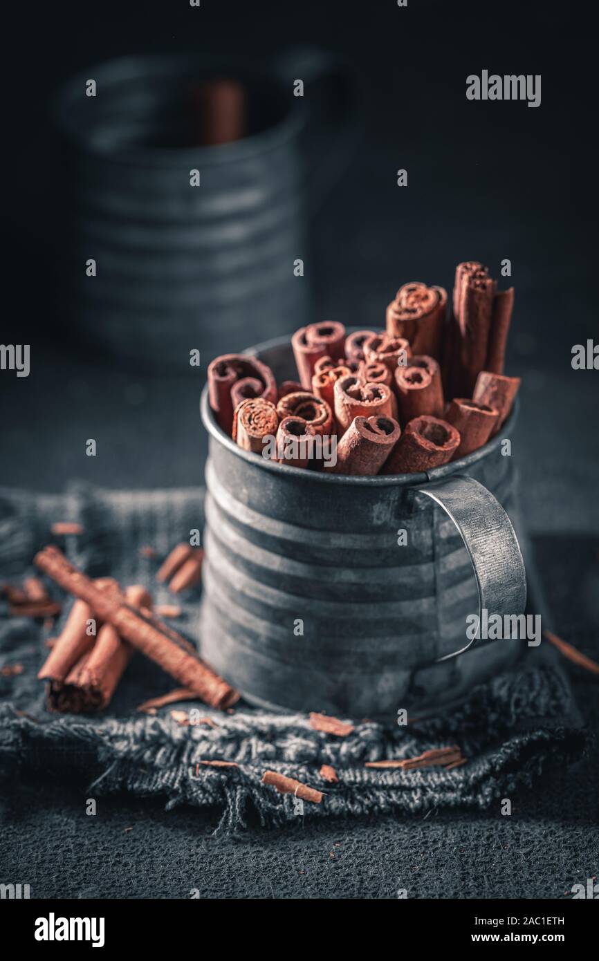 Heap of cinnamon sticks as oldest spice in the world Stock Photo - Alamy