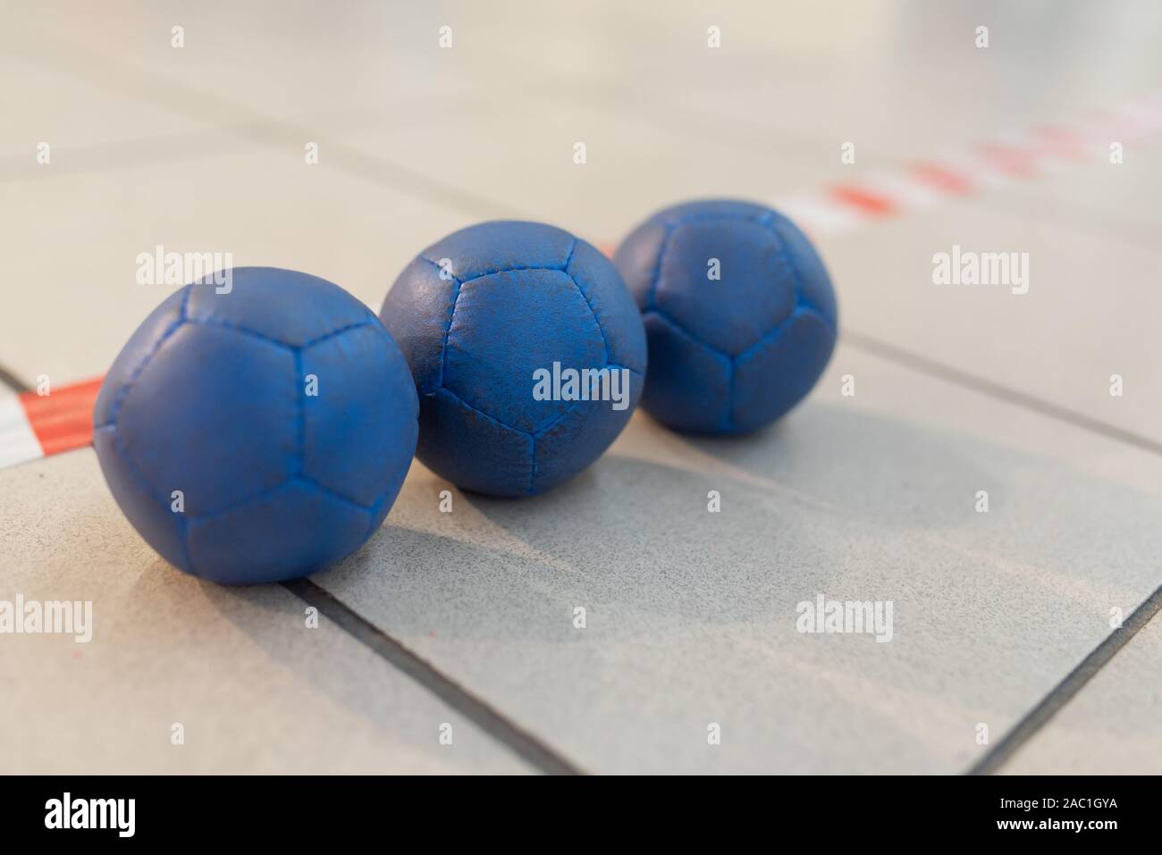 Boccia balls, blue, on the field line Stock Photo - Alamy