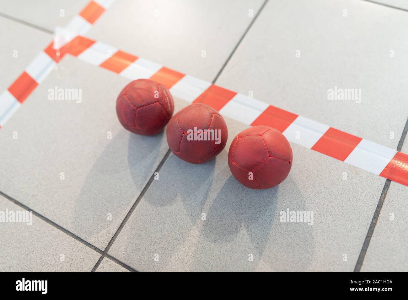 Boccia balls, red, on the field line Stock Photo - Alamy