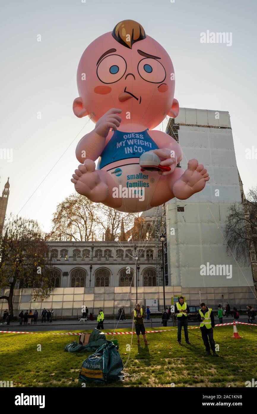 London, UK. 29th Nov, 2019. A 6-meter helium-filled inflatable baby ...