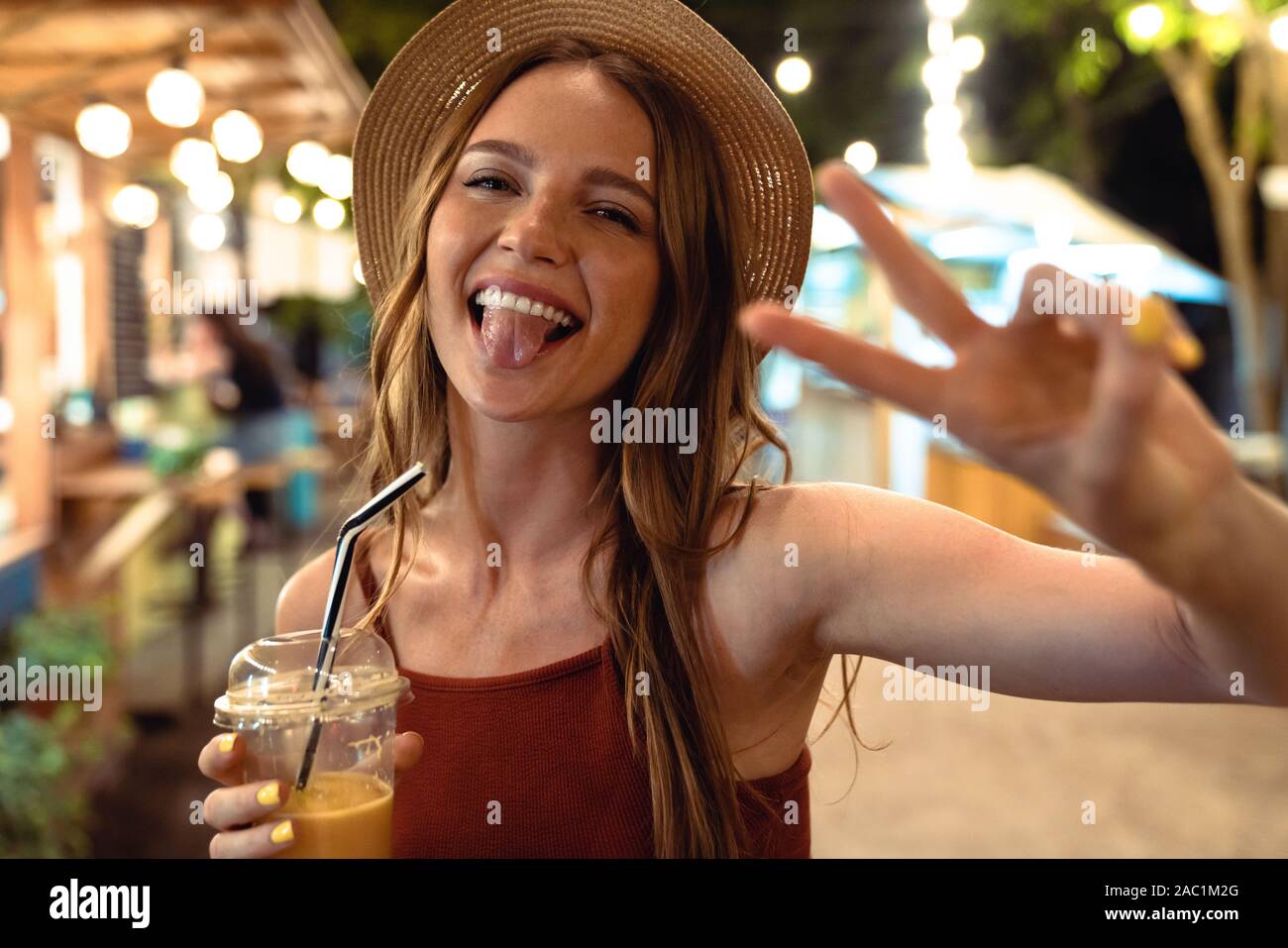 Image of a positive optimistic happy cheery woman walking by street ...