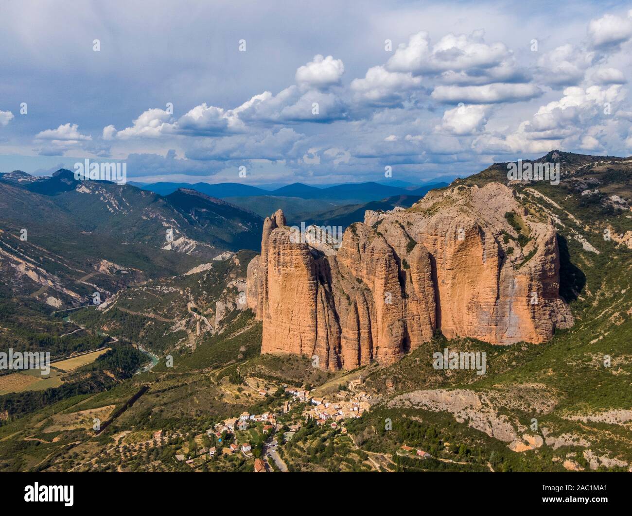 Aerial view of the Mallos de Riglos, a set of conglomerate rock ...