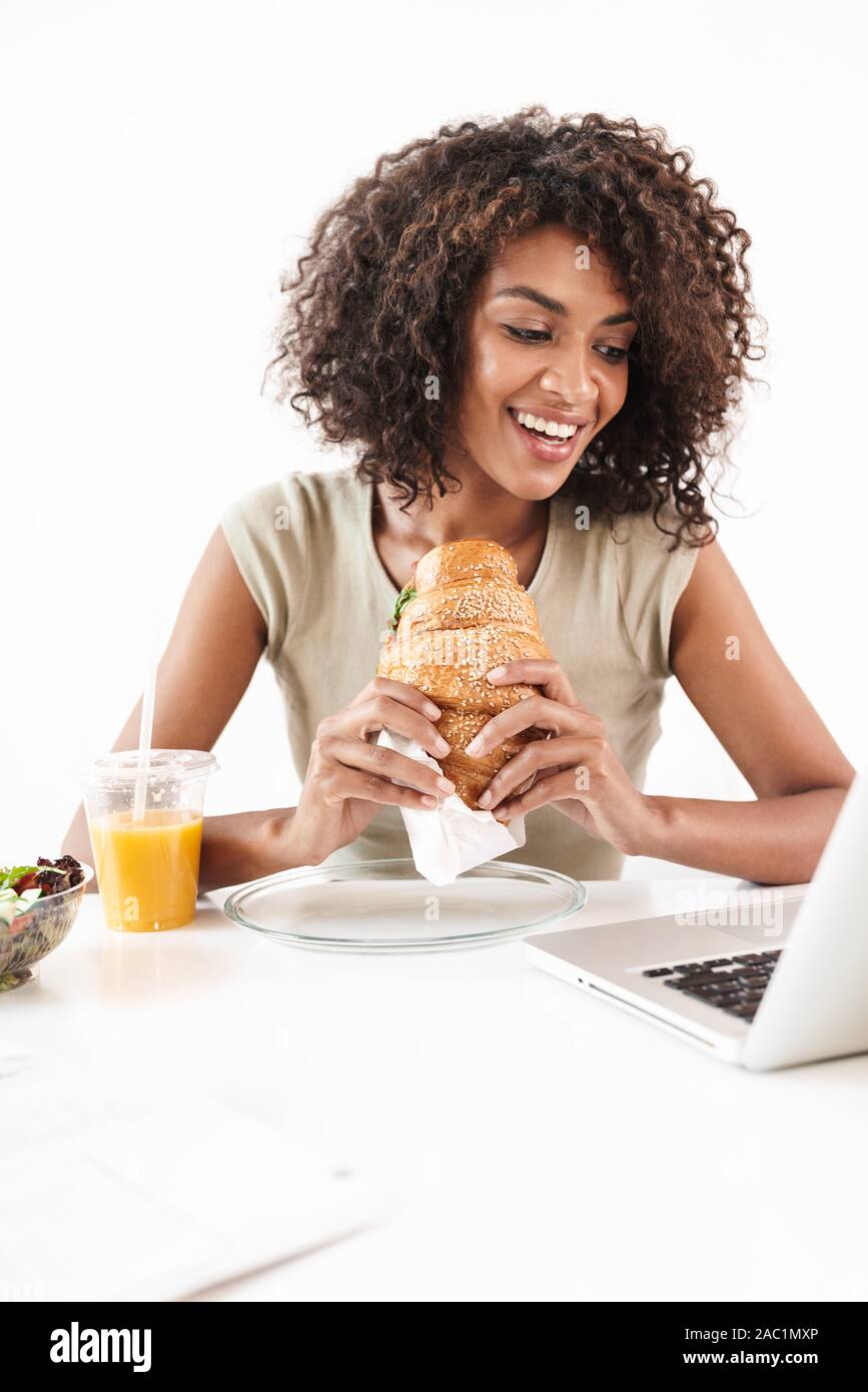 Girl desk food computer Cut Out Stock Images & Pictures - Alamy
