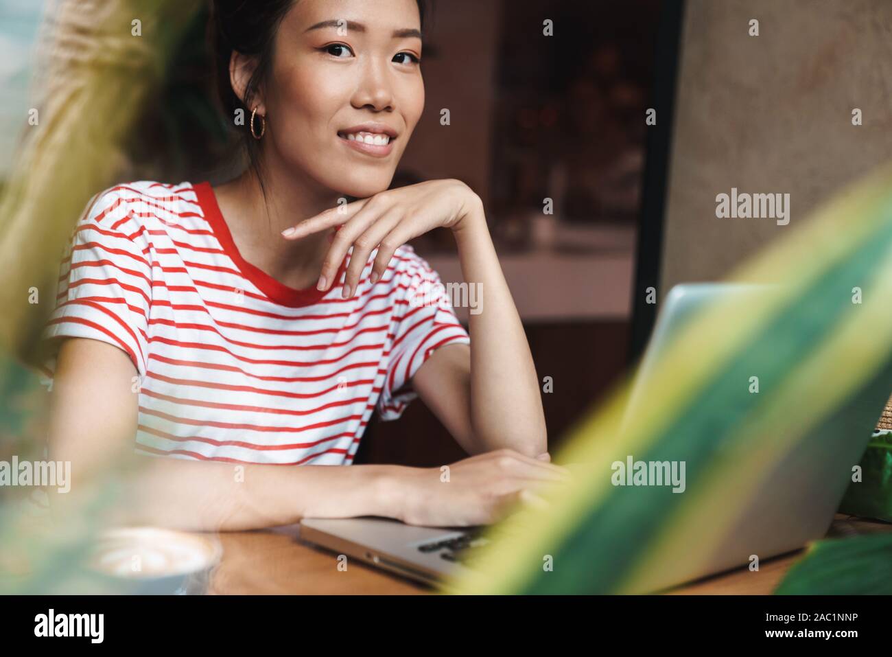 Portrait of beautiful asian woman using laptop computer while sitting ...