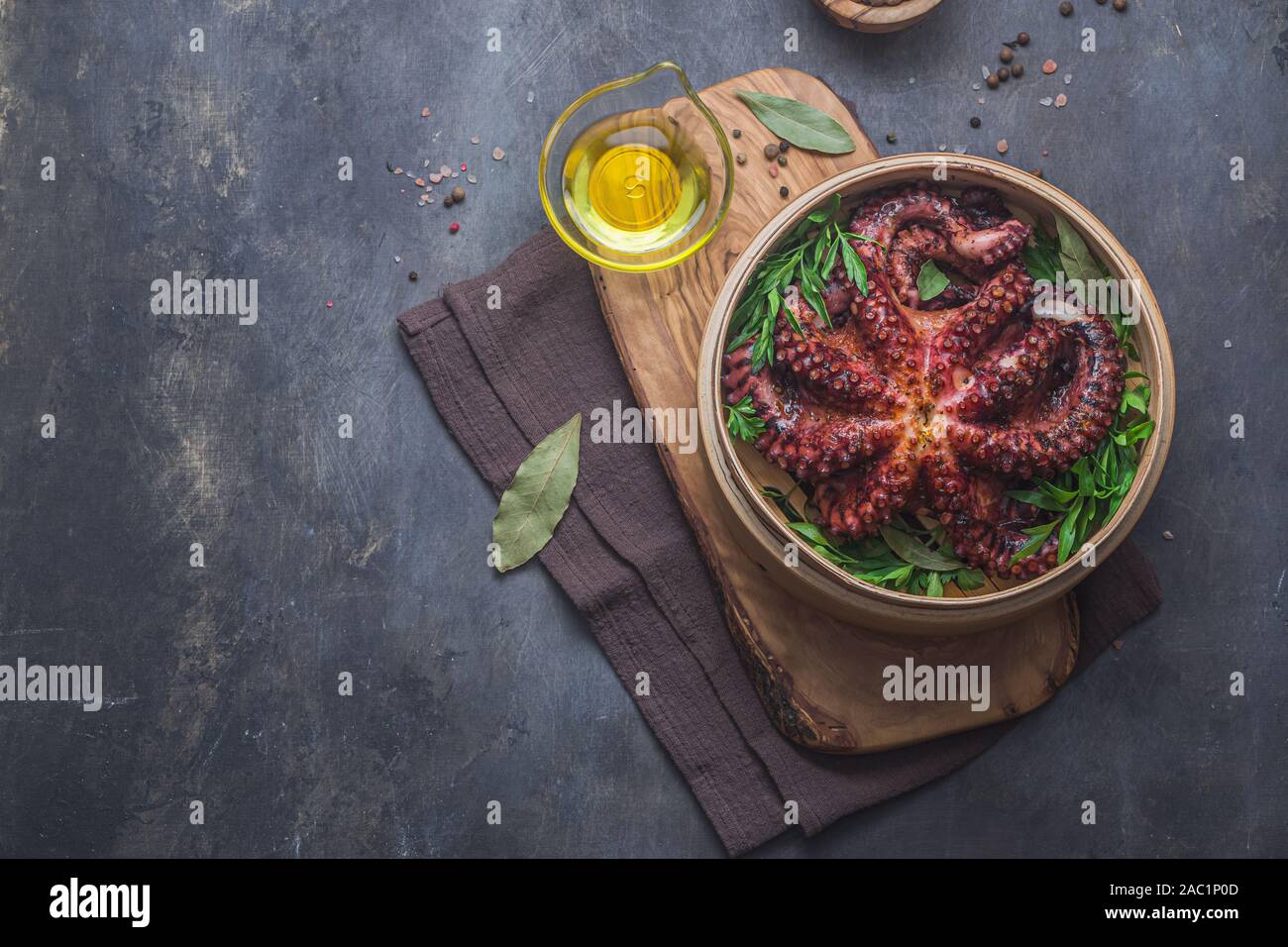 Whole steamed octopus with parsley and spices, copy space Stock Photo ...
