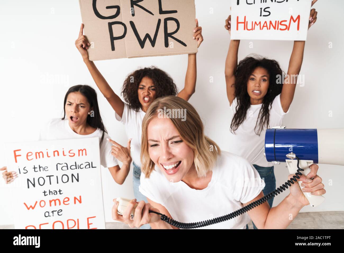 Image of a displeased agressive young women multiracial friends posing ...