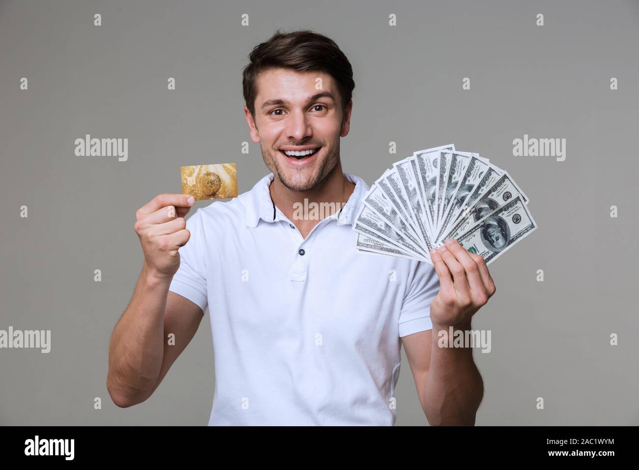 Image of a young happy positive optimistic man posing isolated over ...